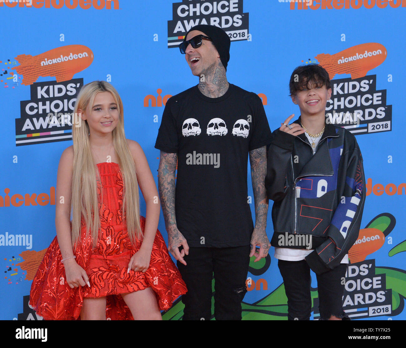 Travis Barker (C) and his daughter Alabama Luella Barker (L) and son ...