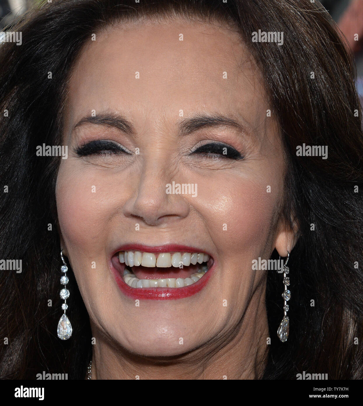 Actress and singer Lynda Carter is interviewed by reporters following ...