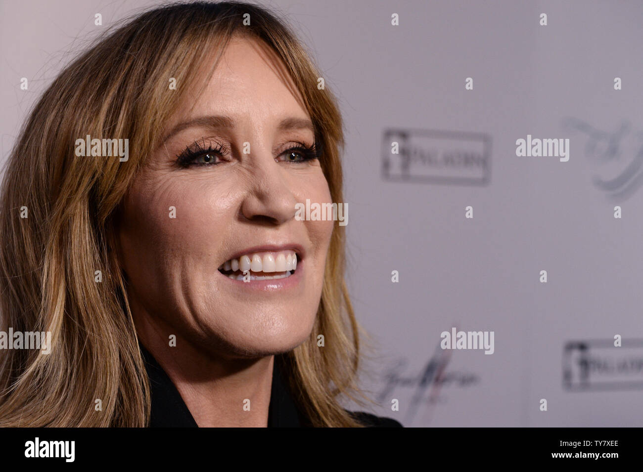Cast member Felicity Huffman attends the premiere of the motion picture ...