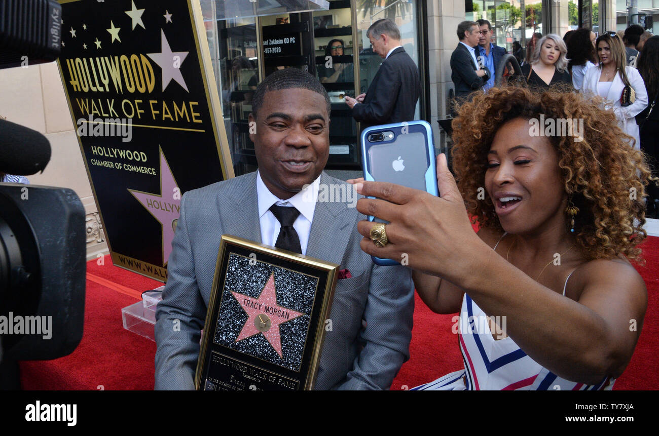 Actor Tracy Morgan does a selfie with a reporter during an unveiling ...