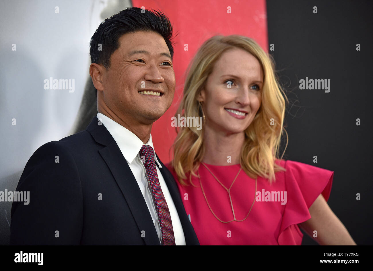 Tom Choi (L) and his wife Jill attend the premiere of Blumhouse's ...