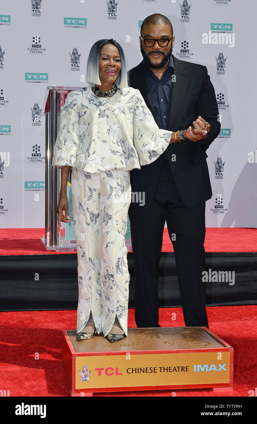 Director, screenwriter and actor Tyler Perry (R) and screen legend ...