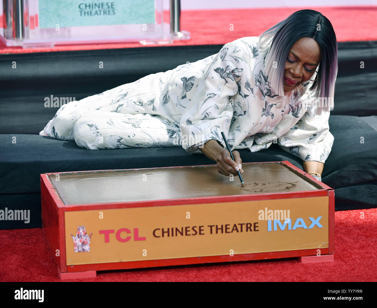 Screen legend Cicely Tyson writes her name in cement during the hand ...
