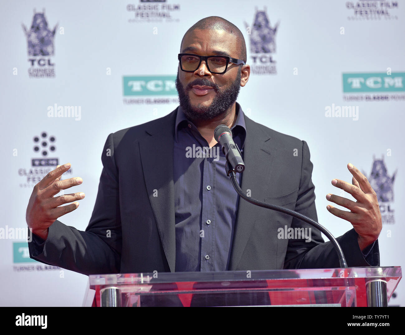 Director, screenwriter and actor Tyler Perry speaks to the audience ...
