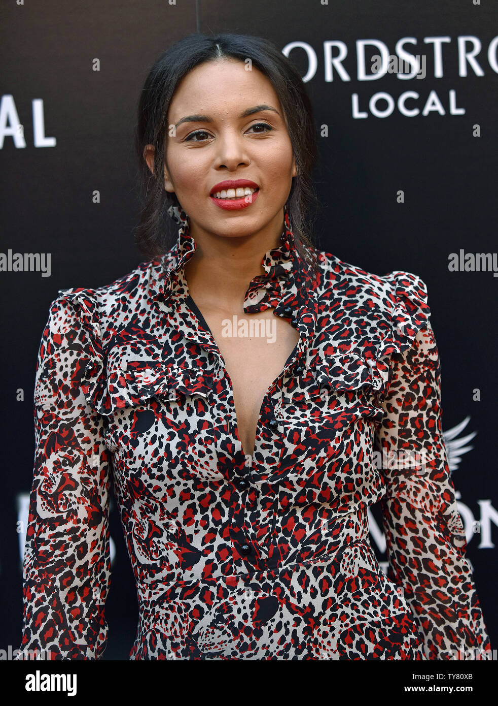 English track and field athlete Louise Hazel attends the premiere of ...