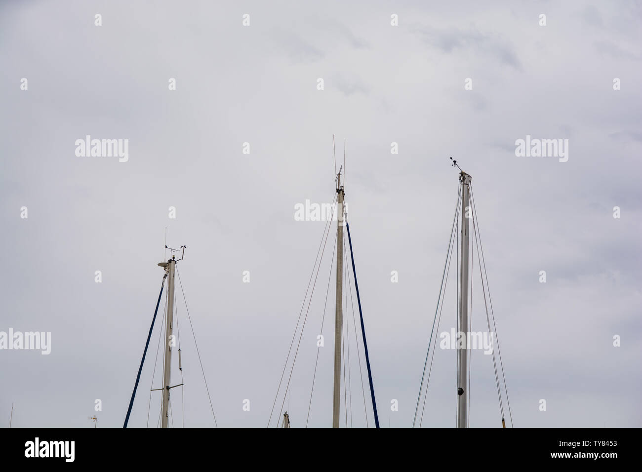Top section of sailing yacht masts Stock Photo - Alamy