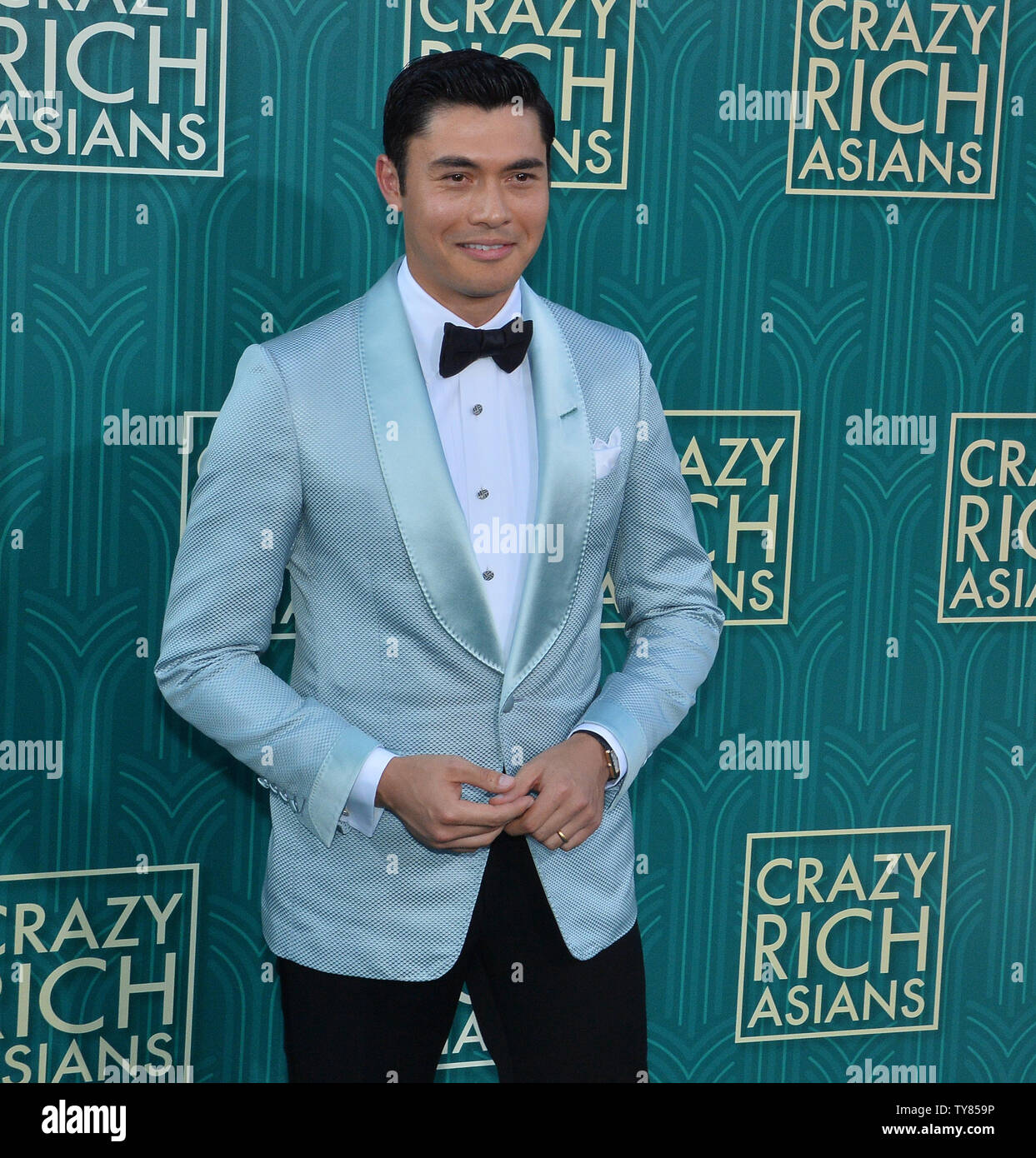 Cast member Henry Golding attends the premiere of the motion picture ...