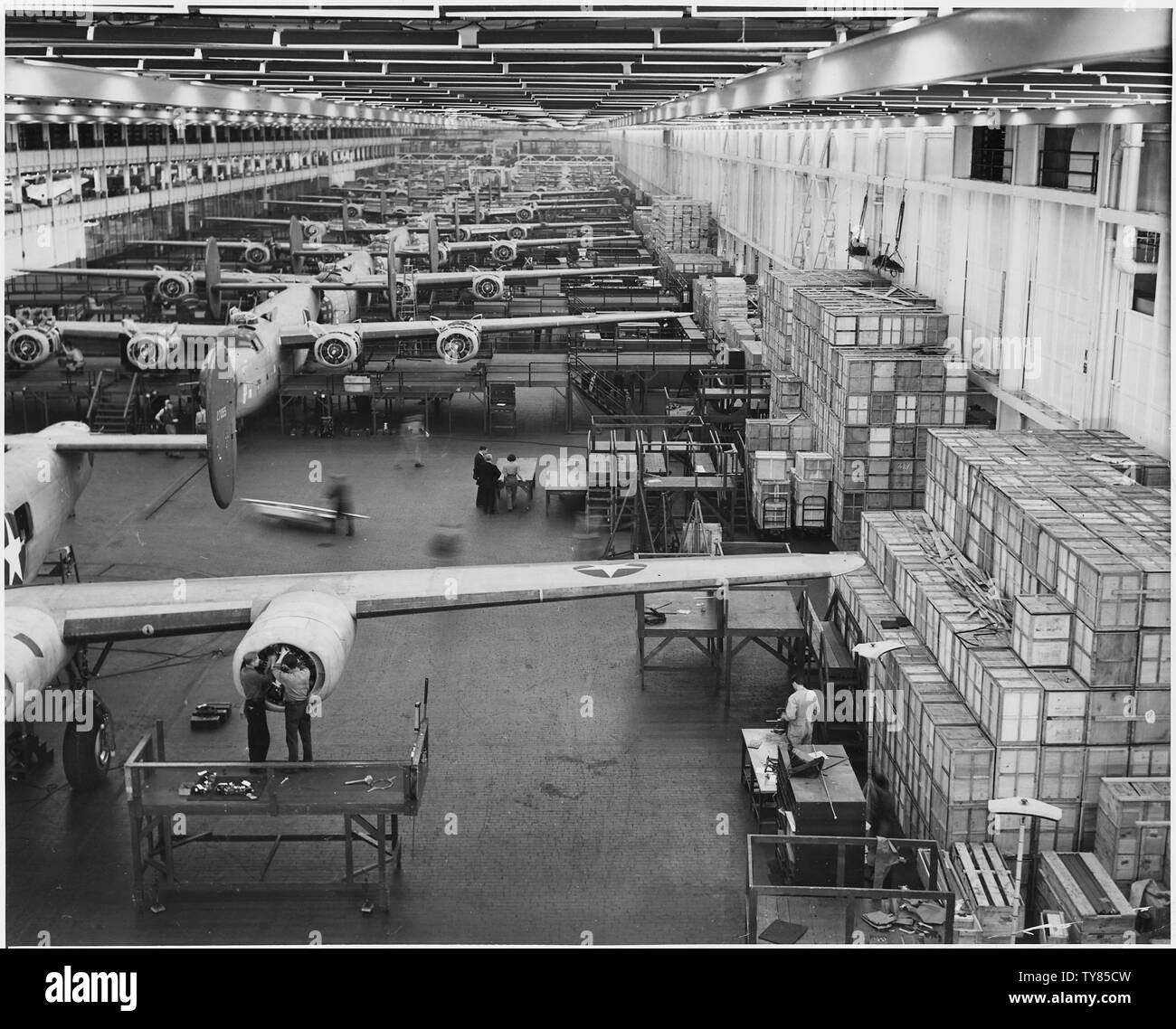 Looking up one of the assembly lines at Ford's big Willow Run plant ...