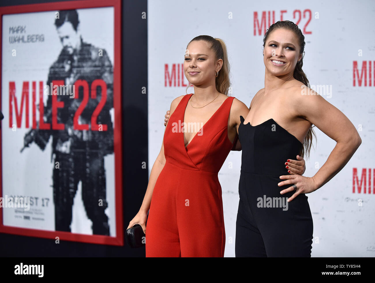Ronda Rousey (R) and her sister Julia DeMars attend the premiere of ...