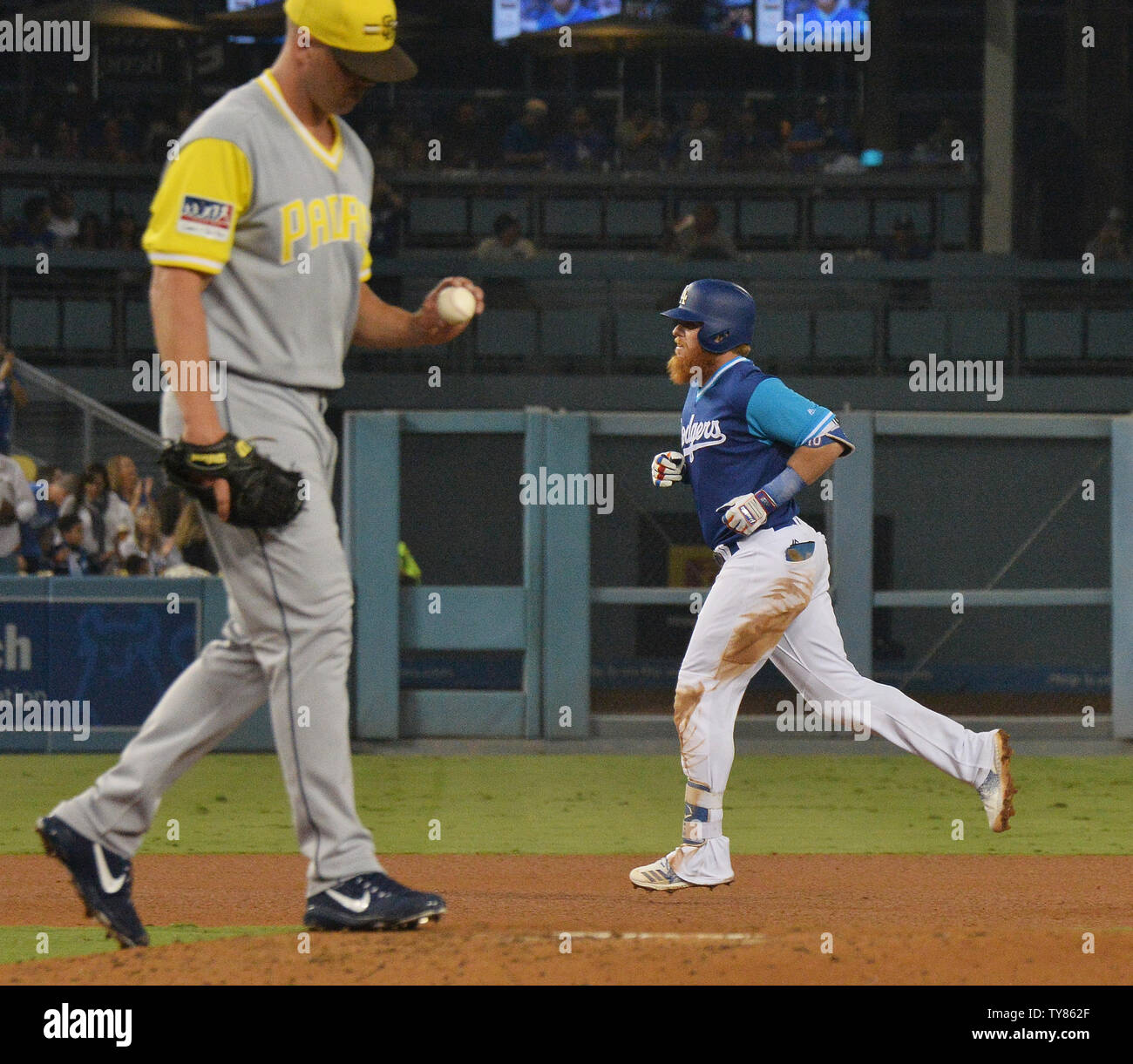 Los Angeles Dodgers' third baseman Justin Turner rounds the bases after ...