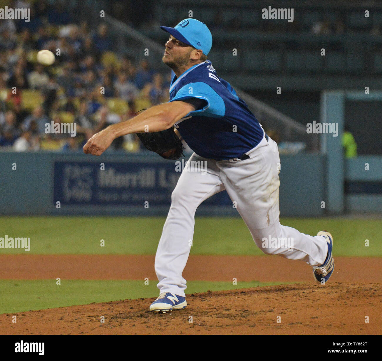 Los Angeles Dodgers' starting pitcher Rich Hill delivers in the third ...