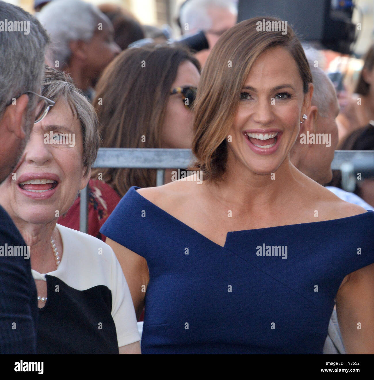 Actress Jennifer Garner shares a light moment with actor Steve Carell ...