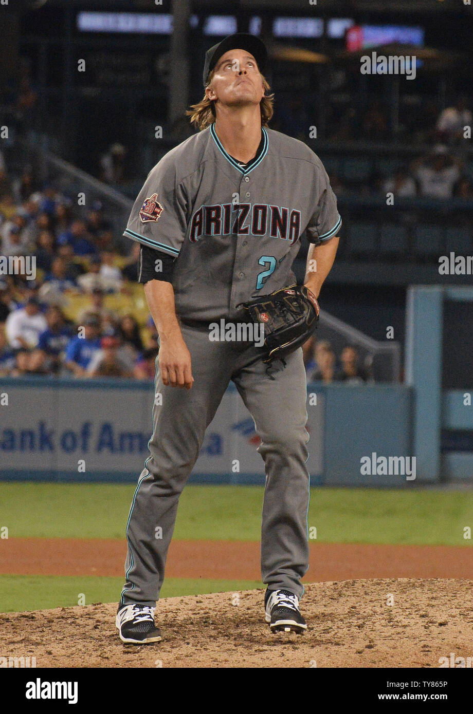 Arizona Diamondbacks' starting pitcher Zack Greinke watches a pop-up go ...