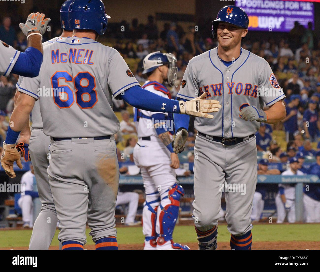 New York Mets' Brandon Nimmo (9) celebrates with teammate Jeff McNeil ...