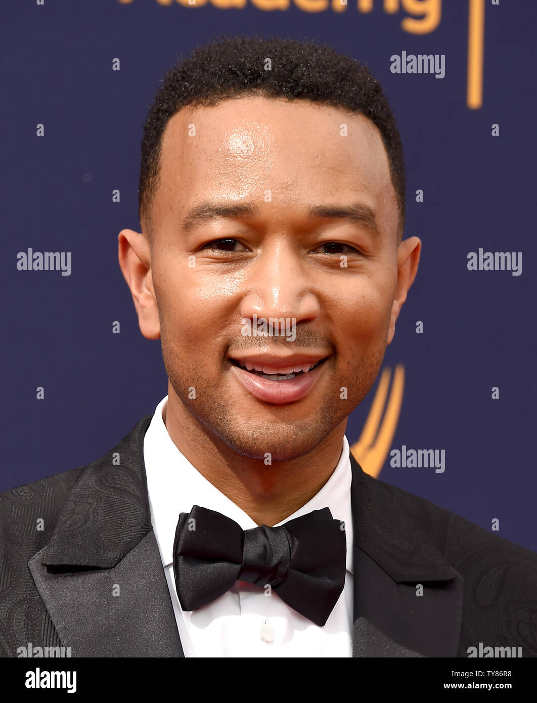 Singer John Legend attends the Creative Arts Emmy Awards at the ...
