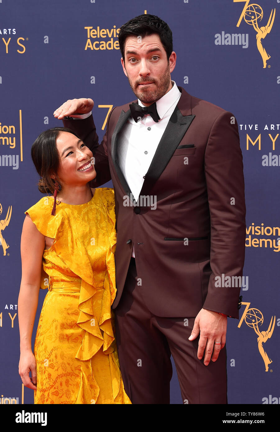 (L-R) Drew Scott and wife Linda Phan attend the Creative Arts Emmy ...