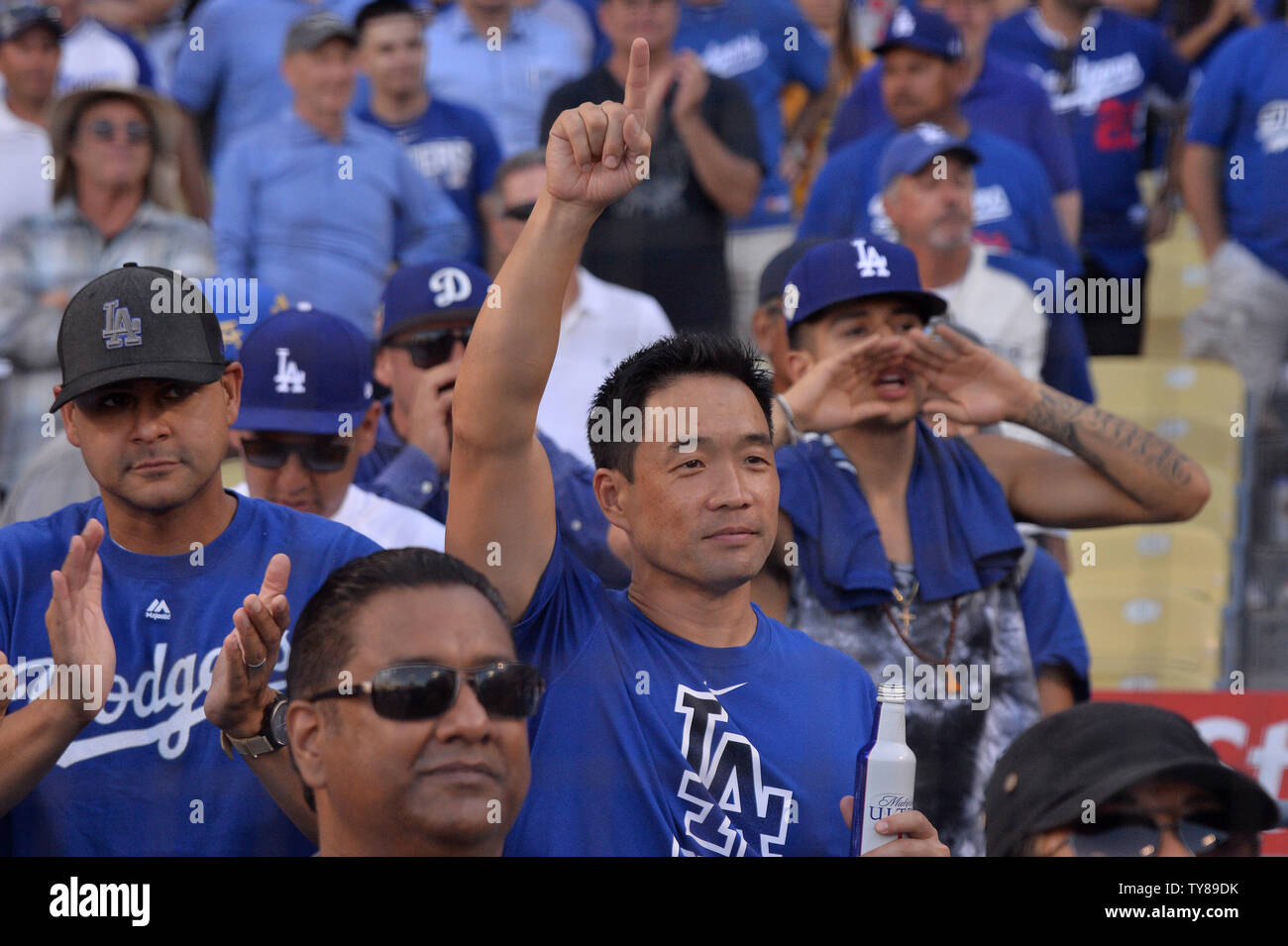 Los Angeles Dodgers fans celebrate after a 5-2 win over the Colorado ...