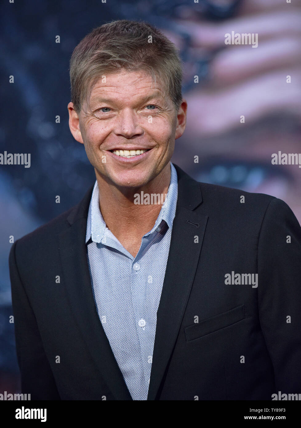 Rob Liefeld attends the premiere of 'Venom' at the Regency Village ...