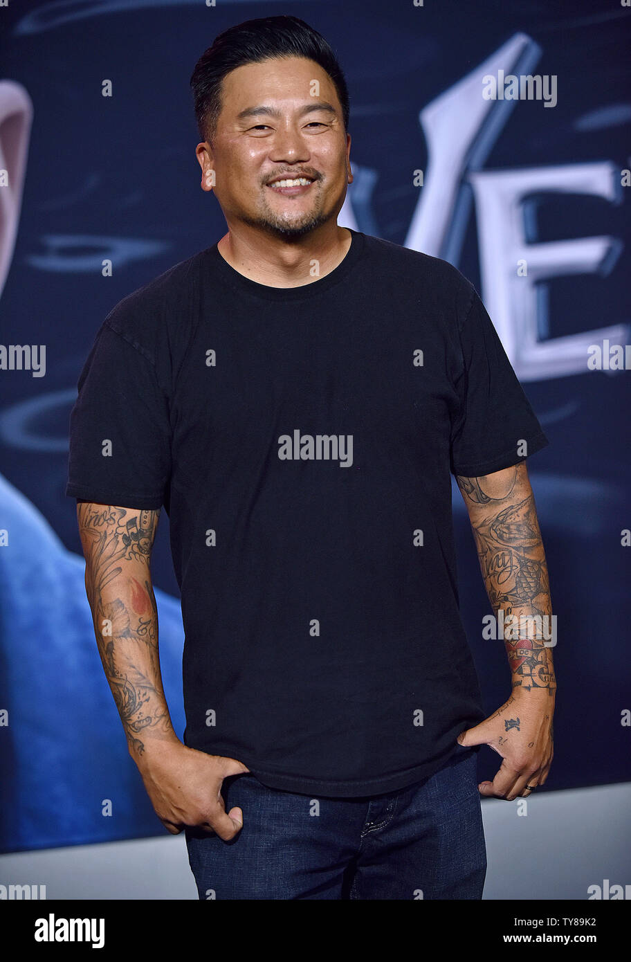 Roy Choi attends the premiere of 'Venom' at the Regency Village Theater ...