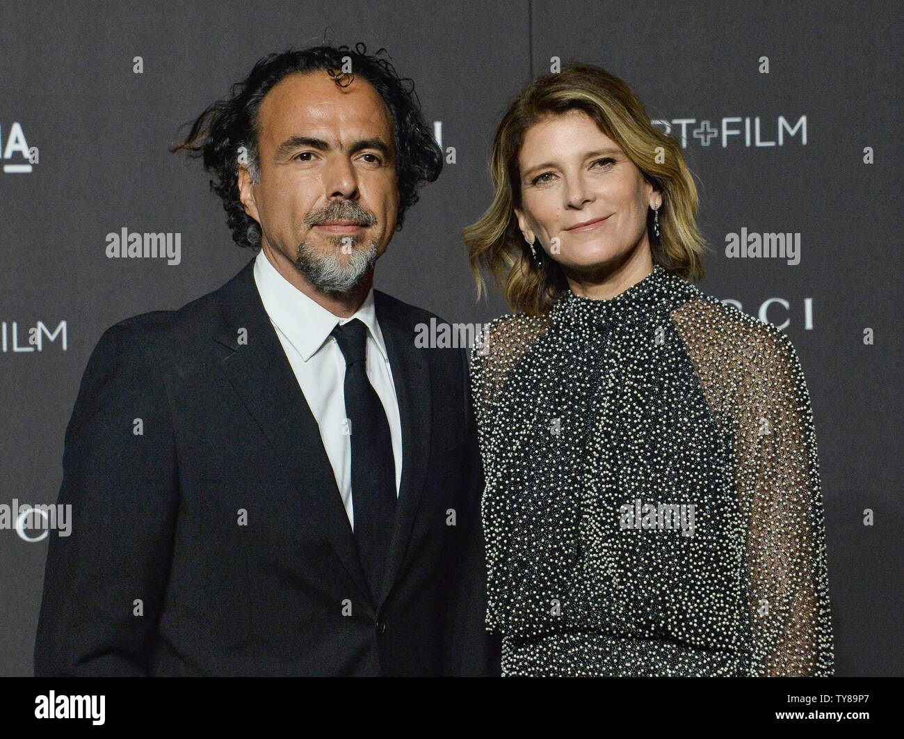 Alejandro Gonzalez Inarritu (L) and his wife Maria Eladia Hagerman ...