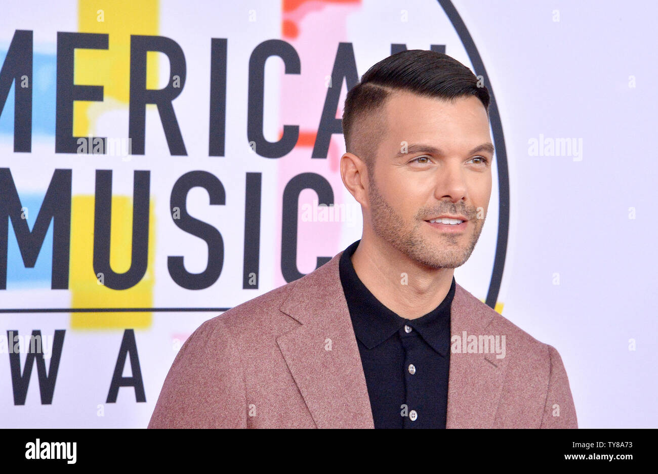 TV personality AJ Gibson arrives for the 46th annual American Music ...