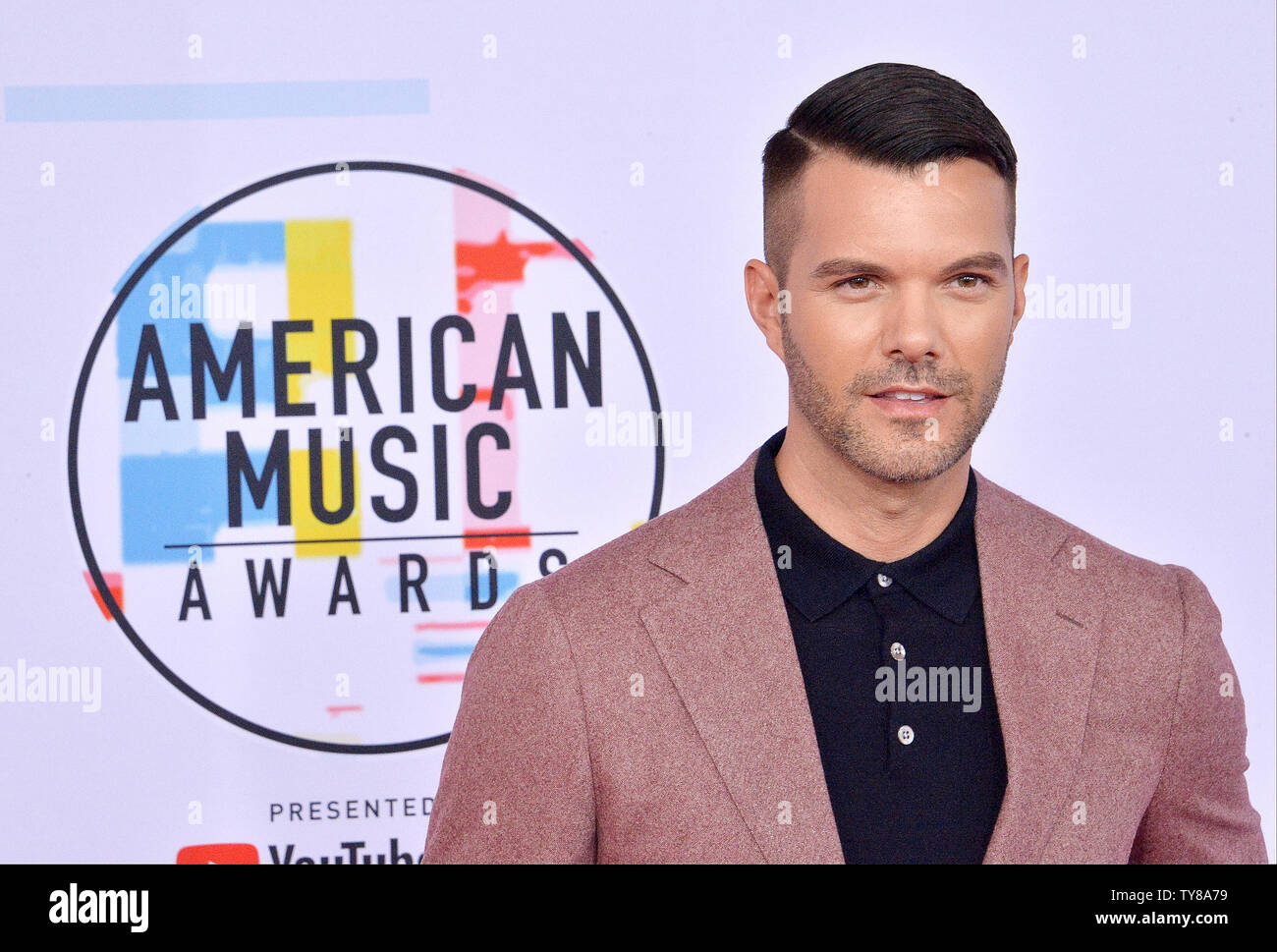 TV personality AJ Gibson arrives for the 46th annual American Music ...