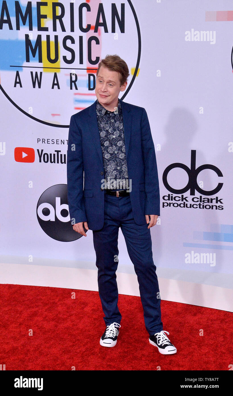 Actor Macaulay Culkin arrives for the 46th annual American Music Awards ...