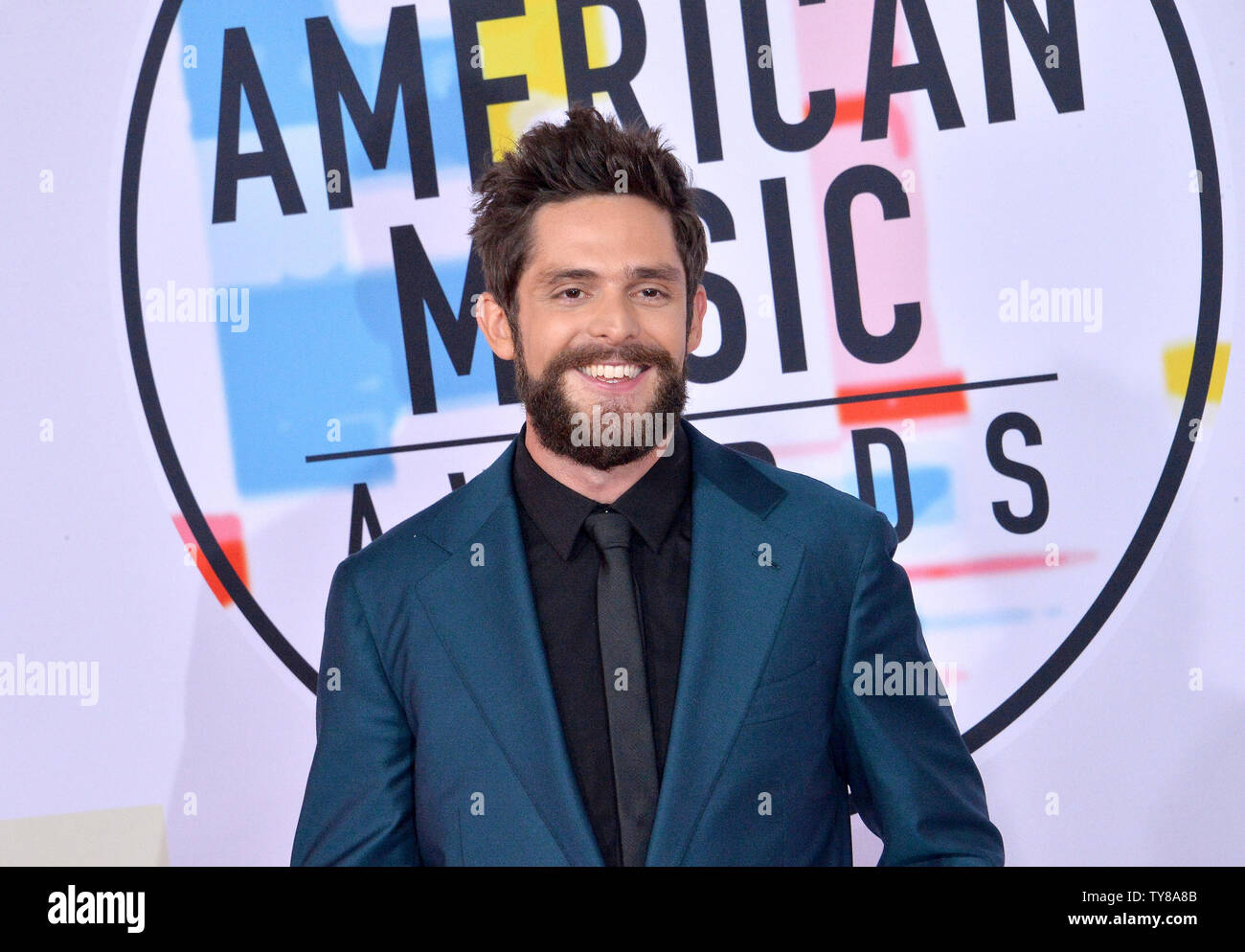 Singer Thomas Rhett arrives for the 46th annual American Music Awards ...