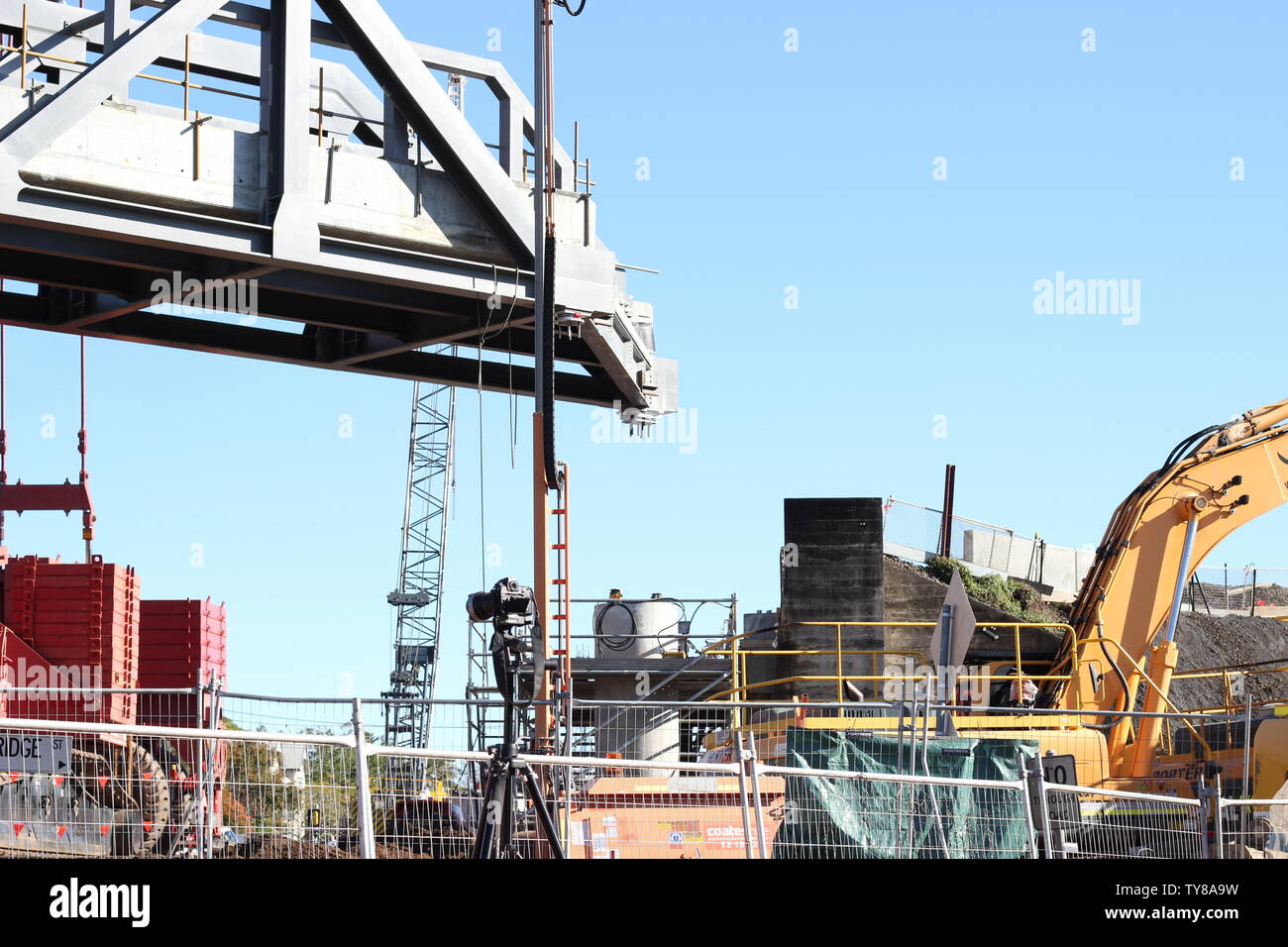 Steel section of rail lifted into place by large crane in Grafton NSW ...