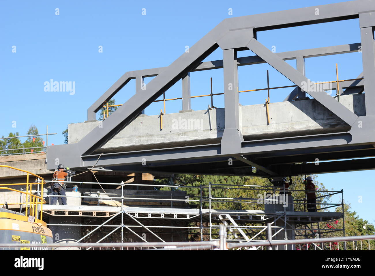 Steel section of rail lifted into place by large crane in Grafton NSW ...