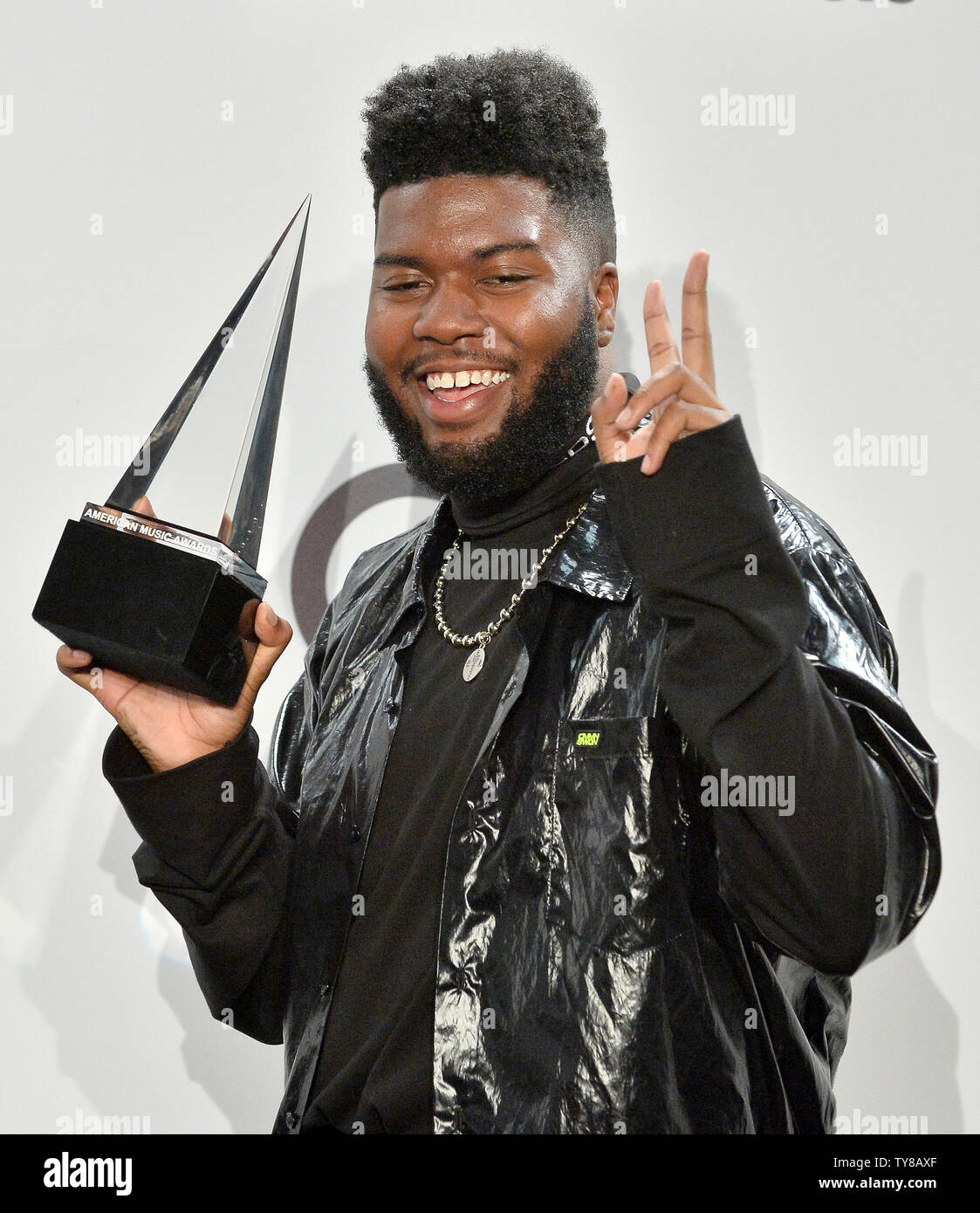 Singer Khalid appears backstage with his award for Favorite Male Artist ...