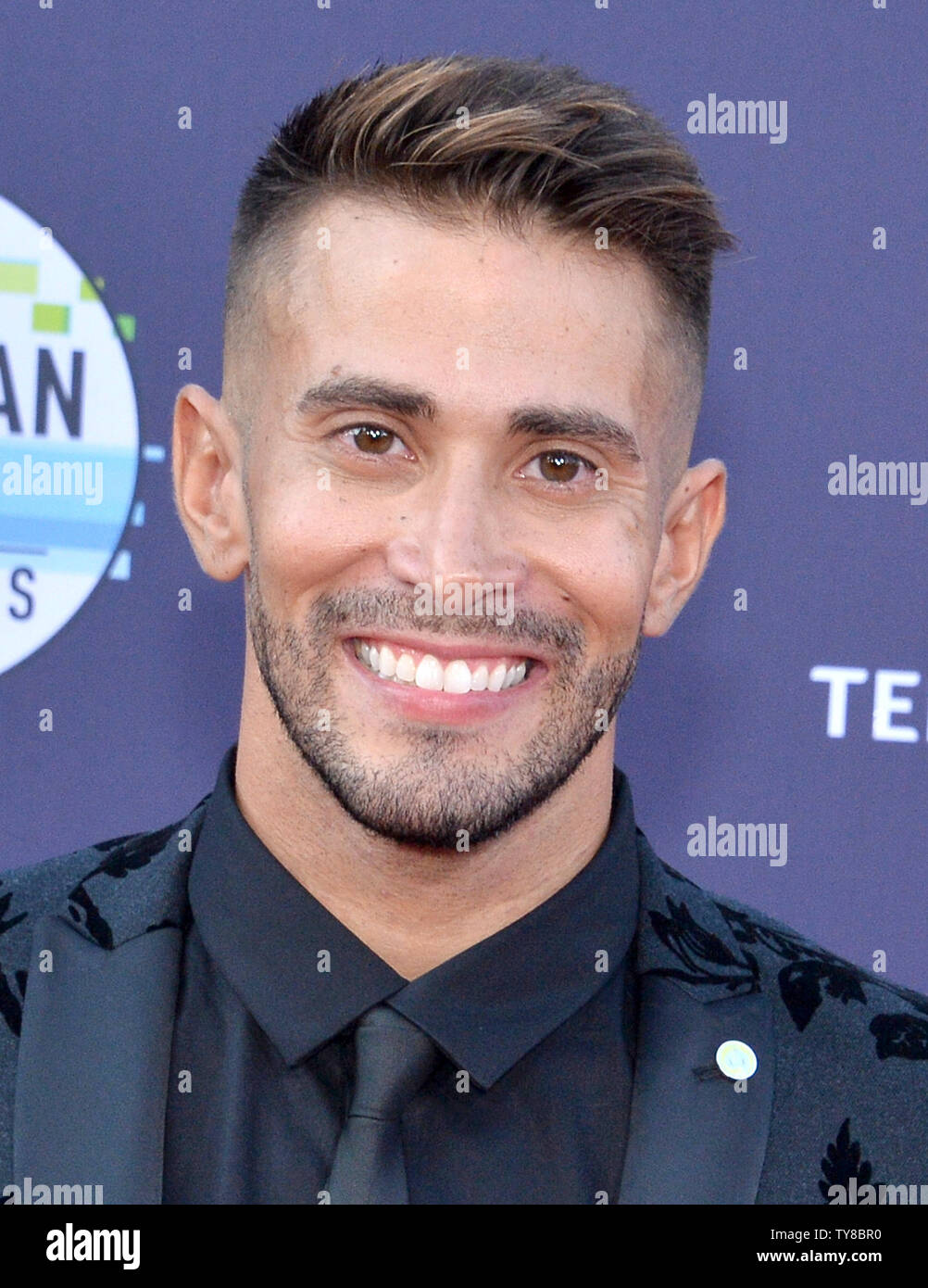 Gymnast Tommy Ramos arrives for the fourth annual Latin American Music ...