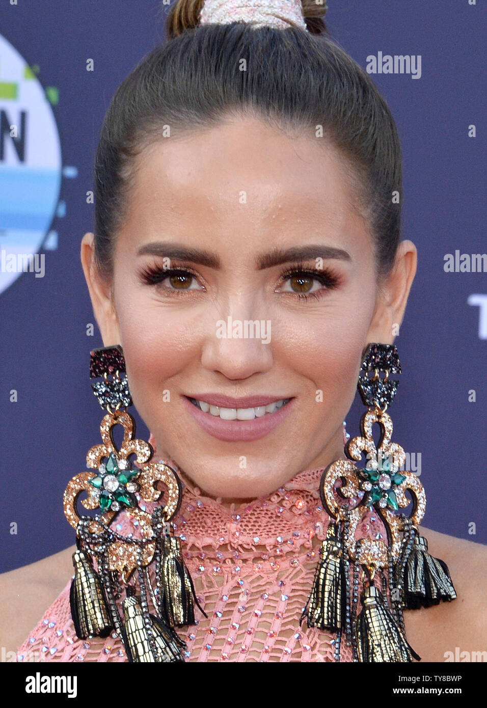 TV personality Andrea Minski arrives for the fourth annual Latin ...
