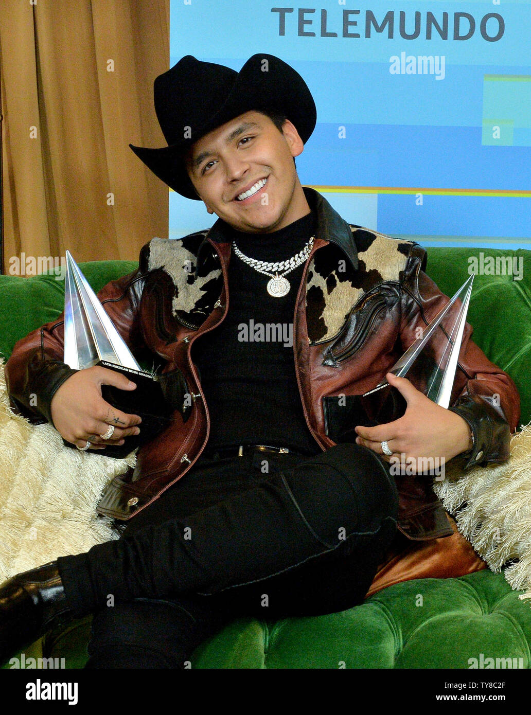 Christian Nodal appears backstage with his awards for Favorite Regional ...