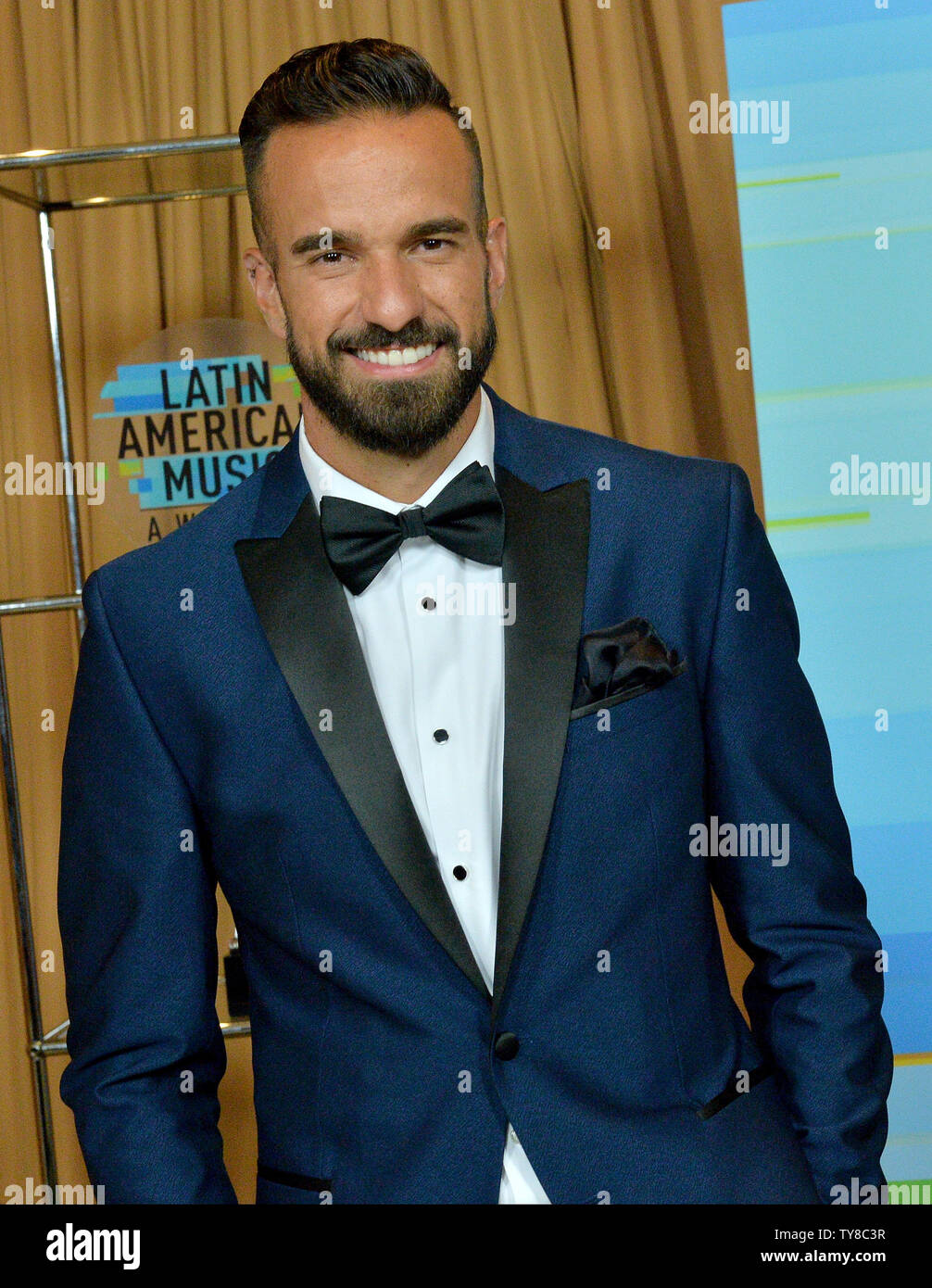 Erasmo Provenza appears backstage at the fourth annual Latin American ...