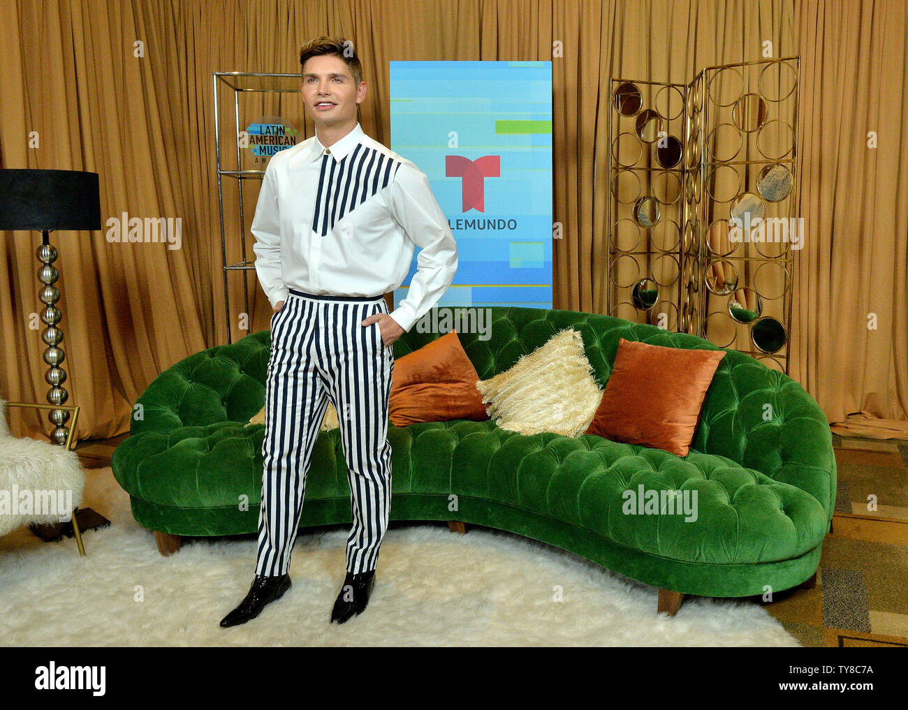 Actor Christian Acosta appears backstage at the fourth annual Latin ...