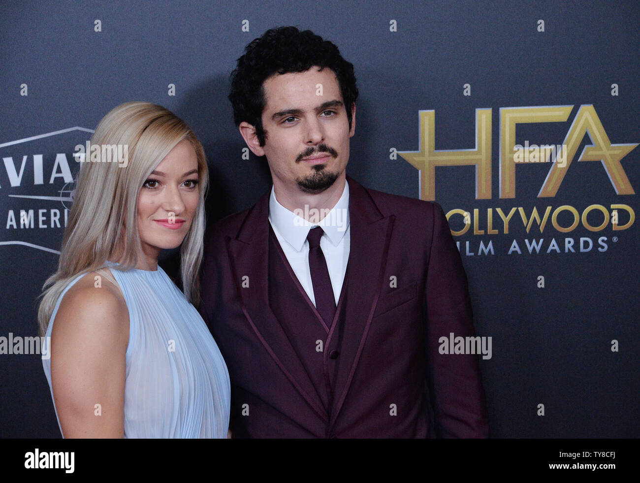 Director Damien Chazelle and his wife, actress Olivia Hamilton arrive ... Director Damien Chazelle and his wife, actress Olivia Hamilton arrive ...