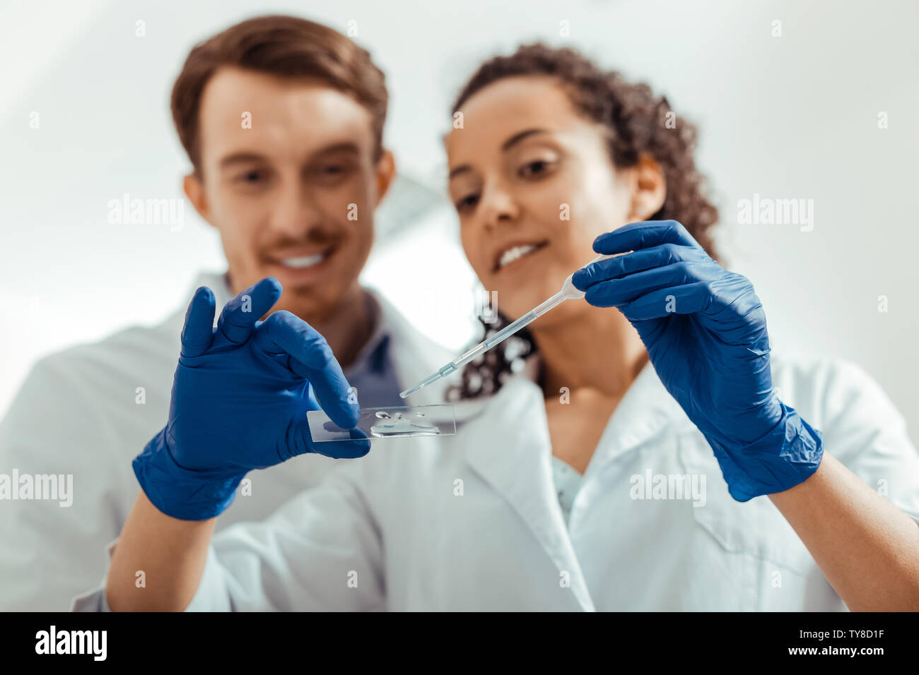 Selective focus of a microscope slide with liquid Stock Photo - Alamy