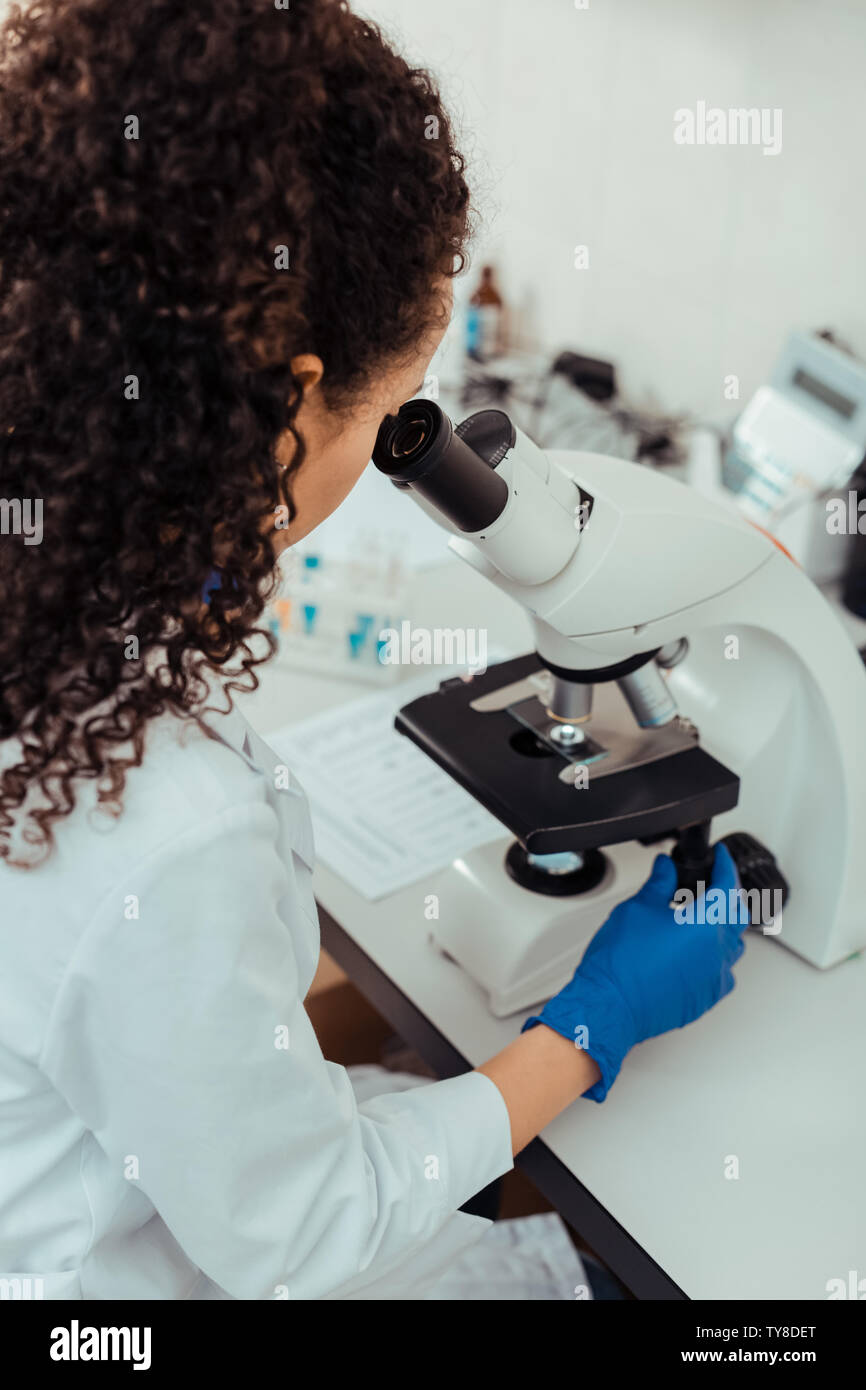 Intelligent female biologist working on her project Stock Photo - Alamy