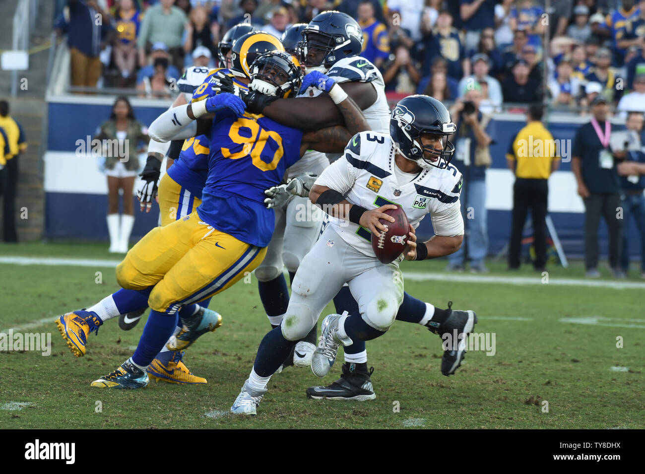 Rams Michael Brookens (90) can't get to Seahawks Russell Wilson in Los ...