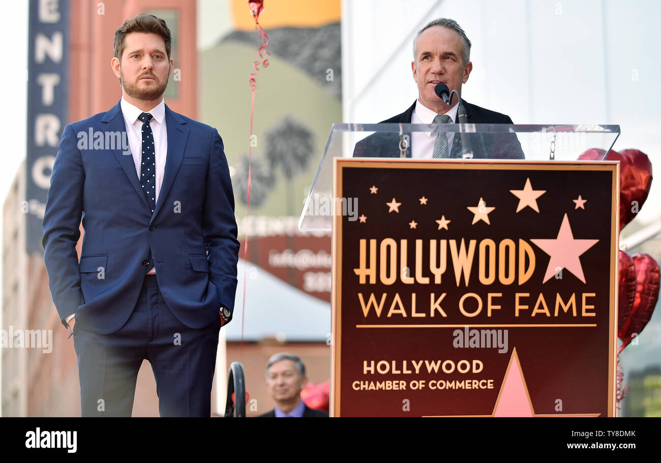Co-Chairman & COO of Warner Brothers Records Tom Corson (R) speaks at ...
