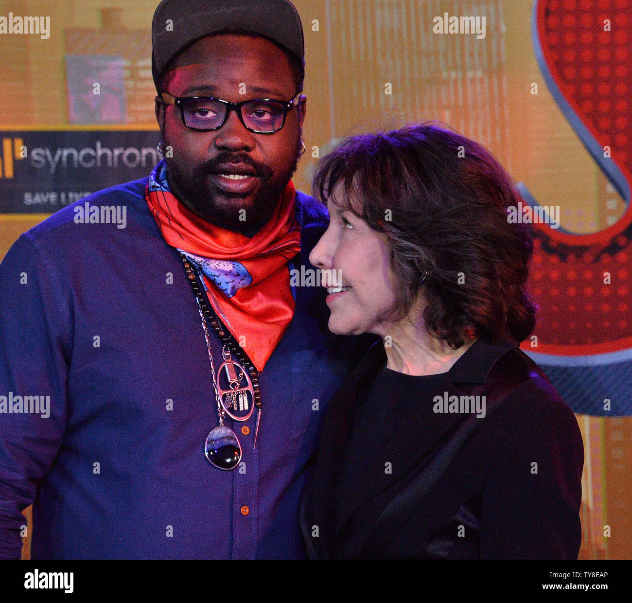 Cast members Brian Tyree Henry and Lily Tomlin attend the premiere of ...