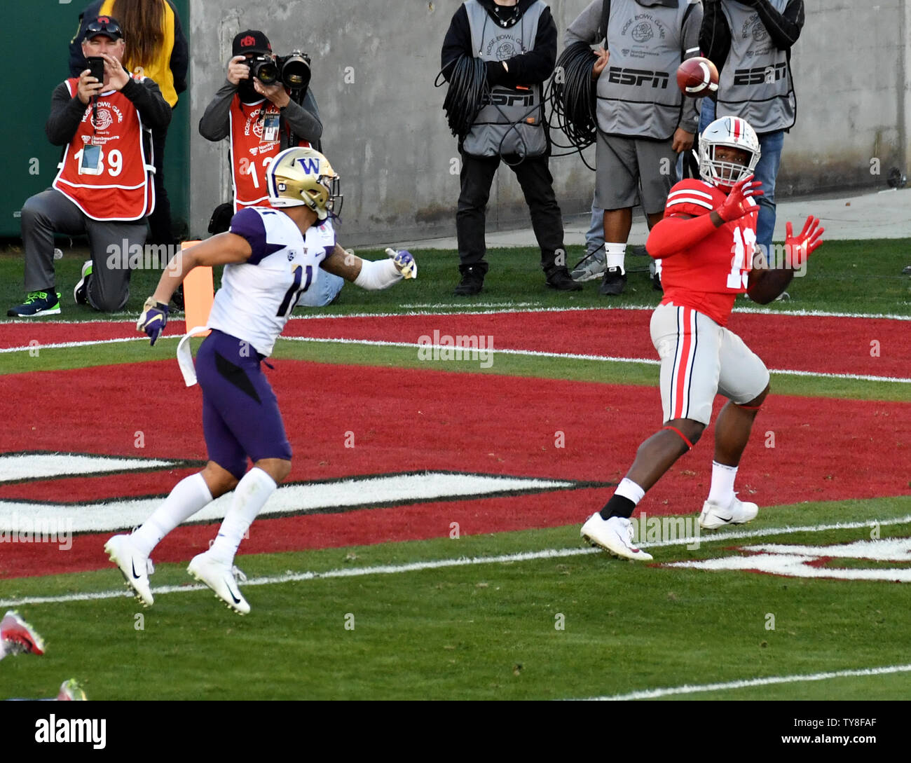 Buckeyes back Rashod Berry scores by Huskies safety Brandon McKinney at ...