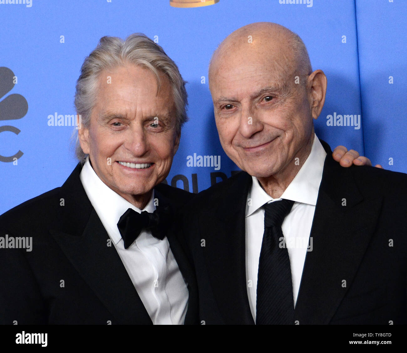 Actors Michael Douglas (L) and Alan Arkin appear backstage during the ...