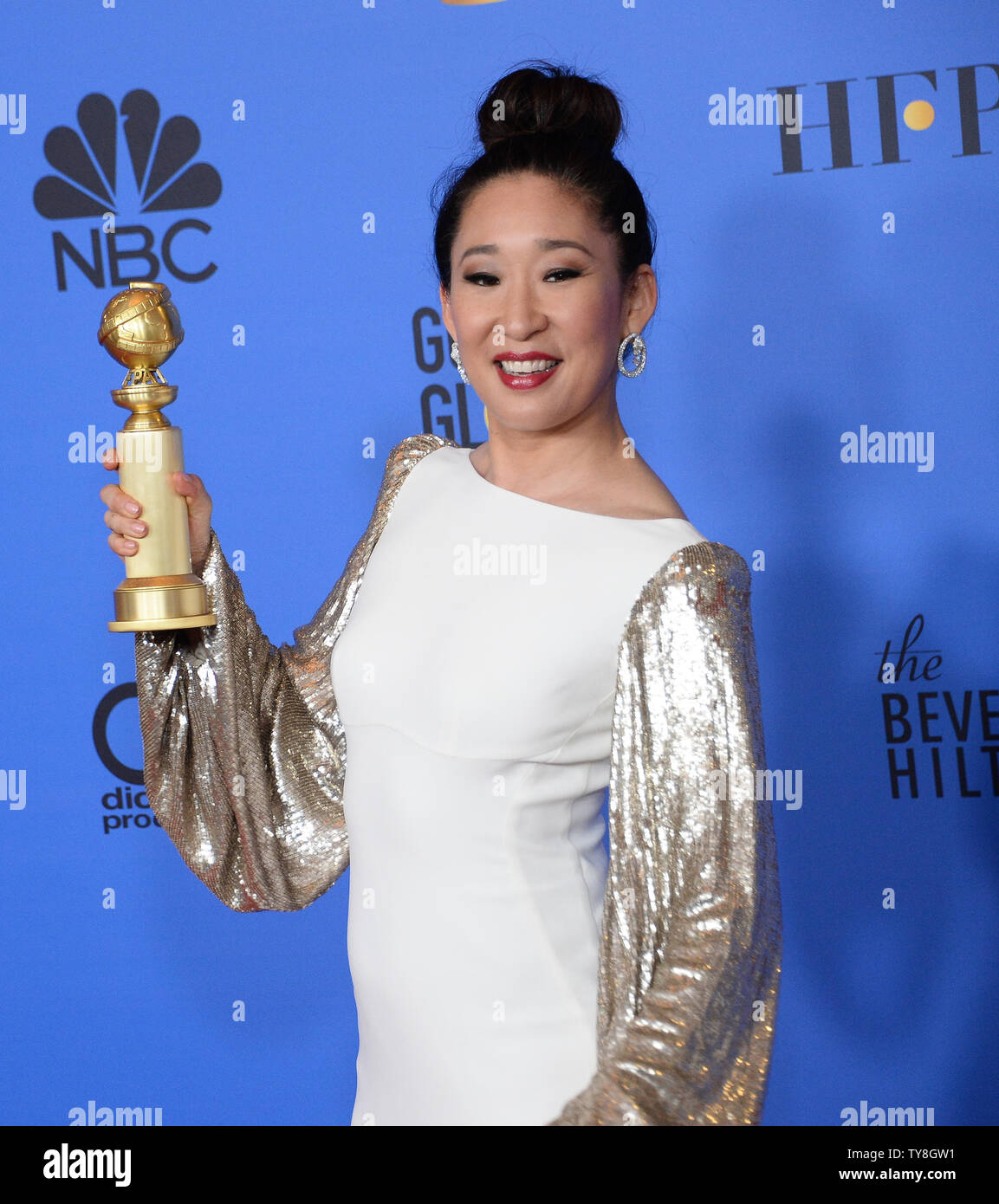 Actor Sandra Oh appears backstage after winning the award for Best ...
