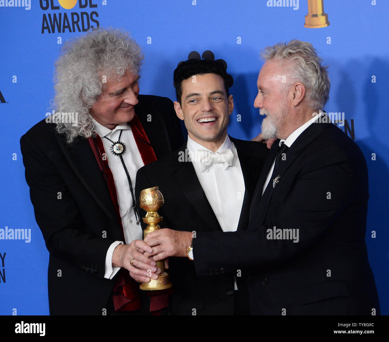 (l-r): Actors Brian May, Rami Malek and Roger Taylor of Queen appears ...