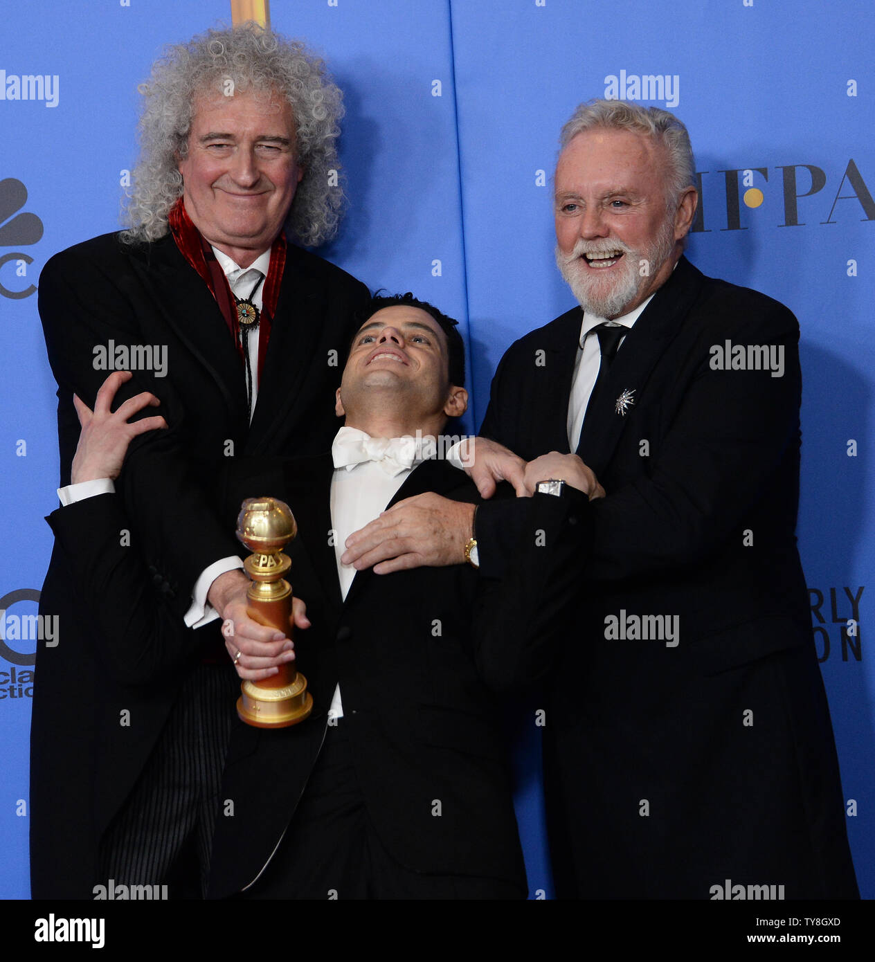 (l-r): Actors Brian May, Rami Malek and Roger Taylor of Queen appears ...