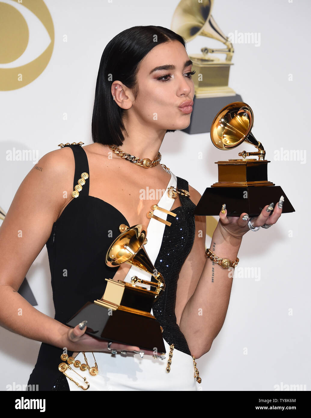 Dua Lipa appears backstage with her awards for Best New Artist and Best ...