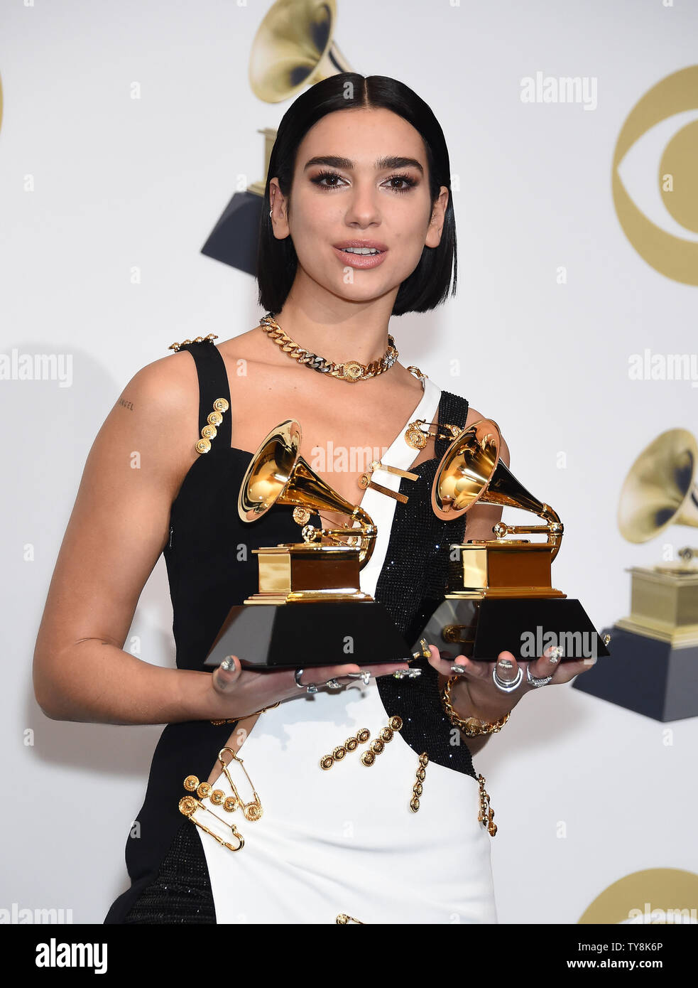 Dua Lipa appears backstage with her awards for Best New Artist and Best ...
