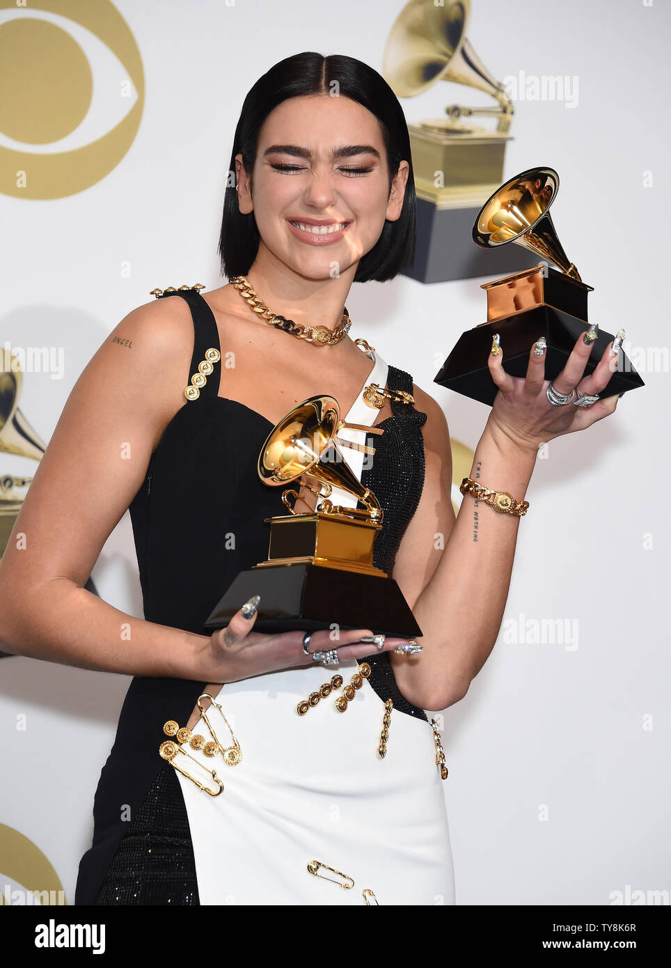 Dua Lipa appears backstage with her awards for Best New Artist and Best ...